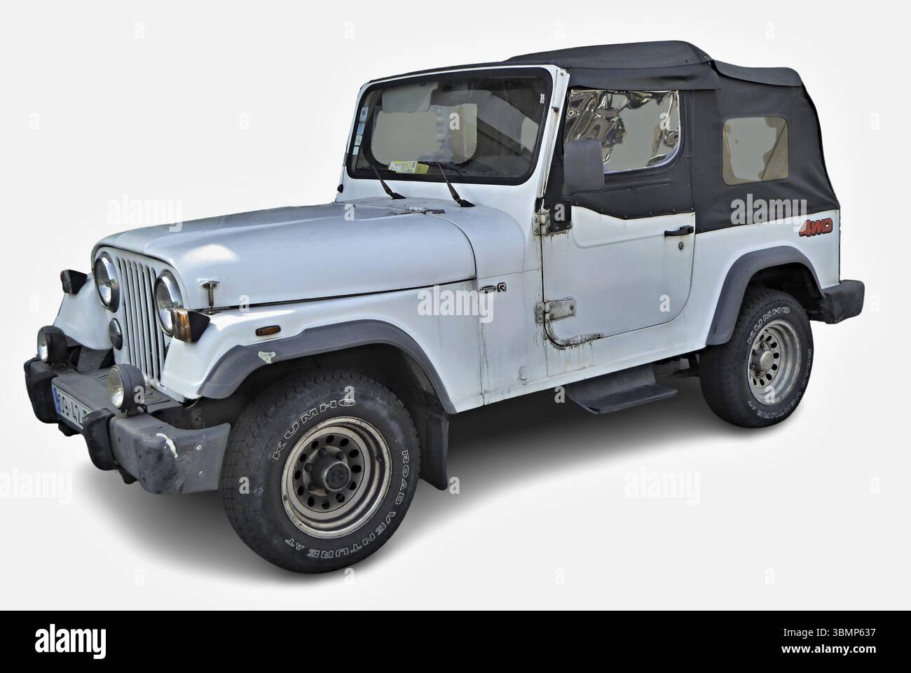 Classic Mahindra Thar 4x4 jeep parked, showcasing its rugged design and off-road capabilities ...