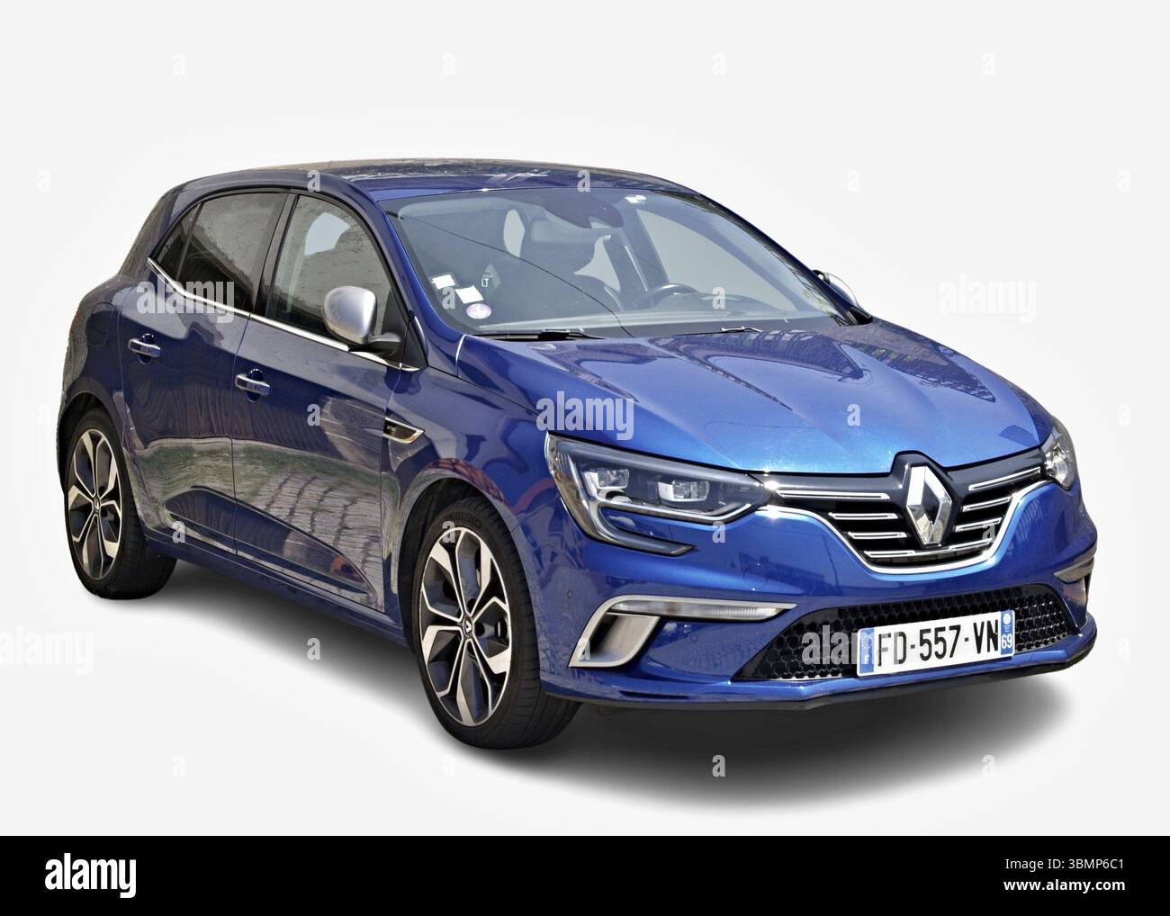 Modern blue Renault Megane parked on white background, showcasing its ...