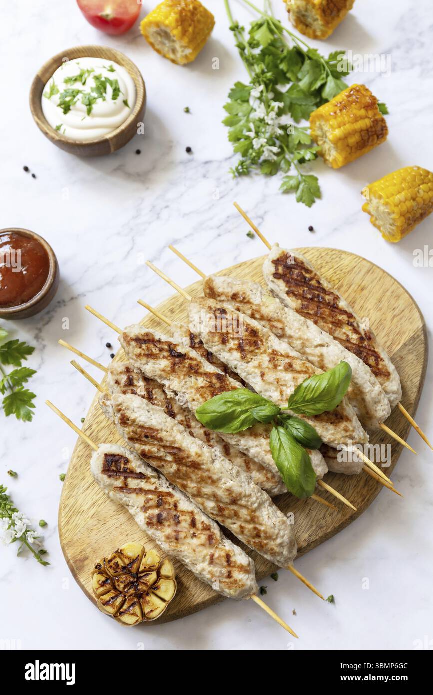 Summer party food. Grill food menu. Bbq grilled chicken kebab with ...