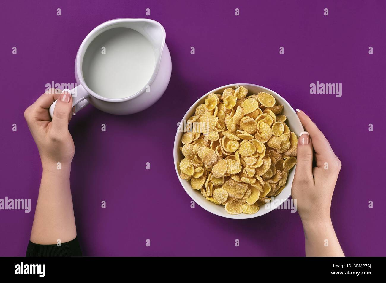 Food and people concept - hands of woman eating cereals corn flakes for ...