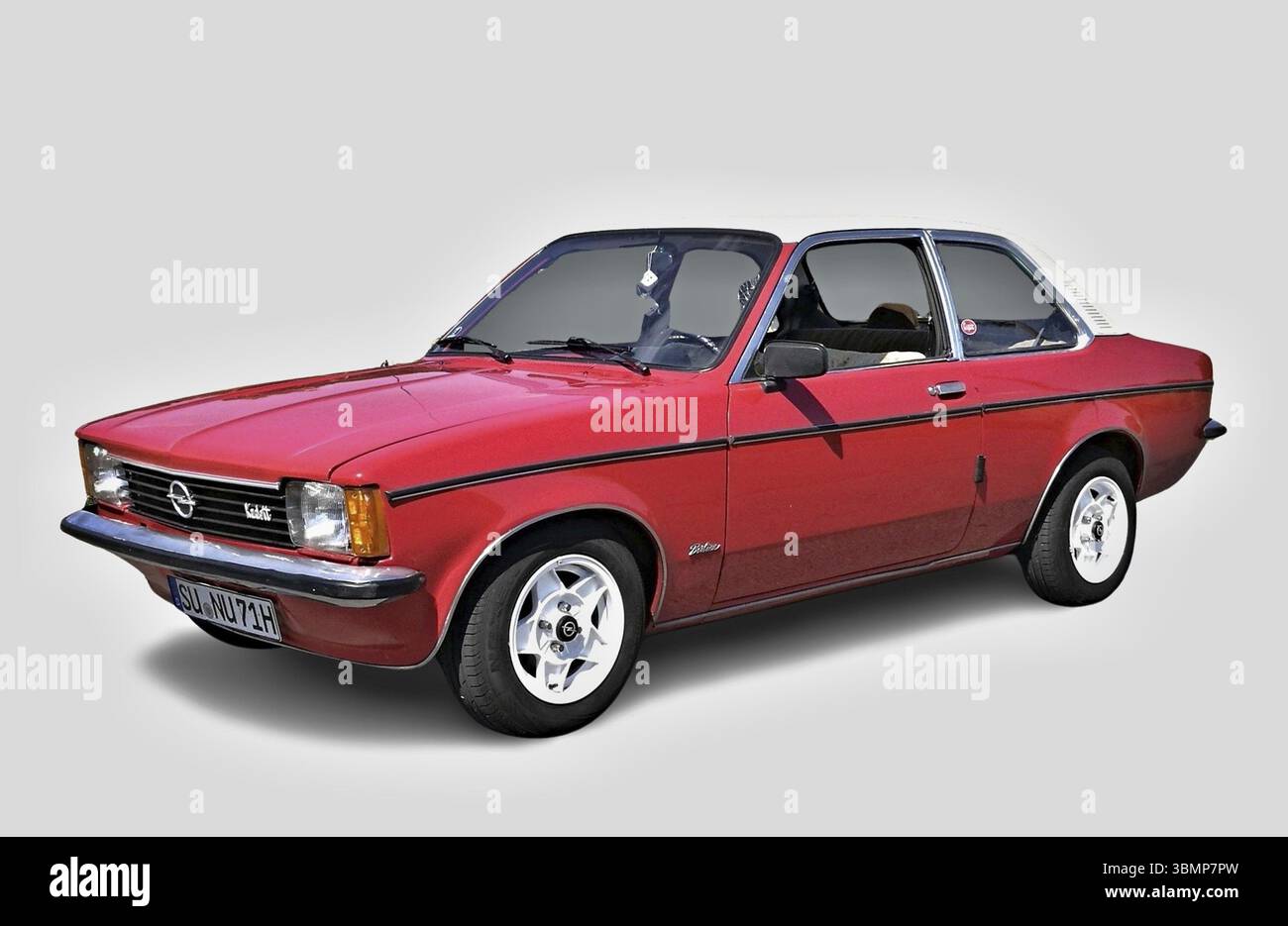 Classic red Opel Kadett C Coupe is posing in a studio with white ...