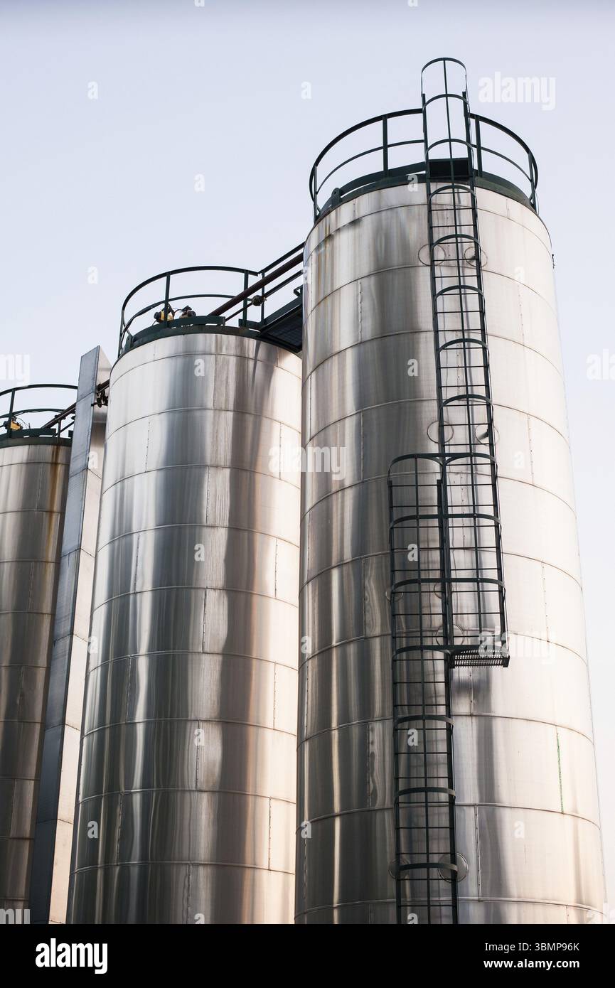 Stainless steel silos in the chemical industry Stock Photo - Alamy