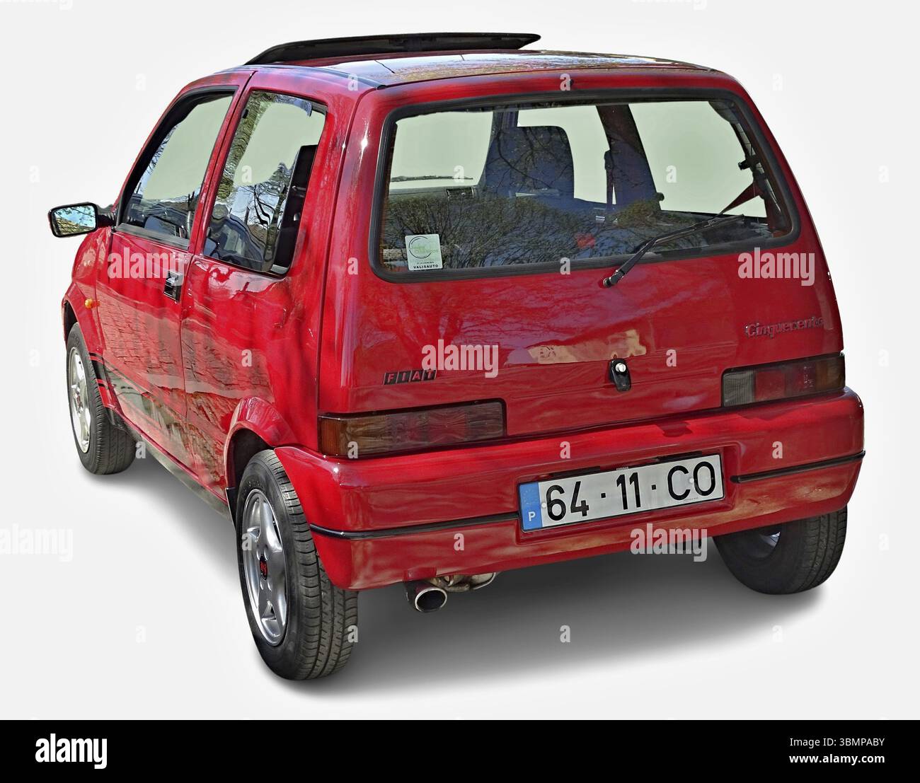 Red Fiat Cinquecento Sporting with sunroof, parked on a white ...