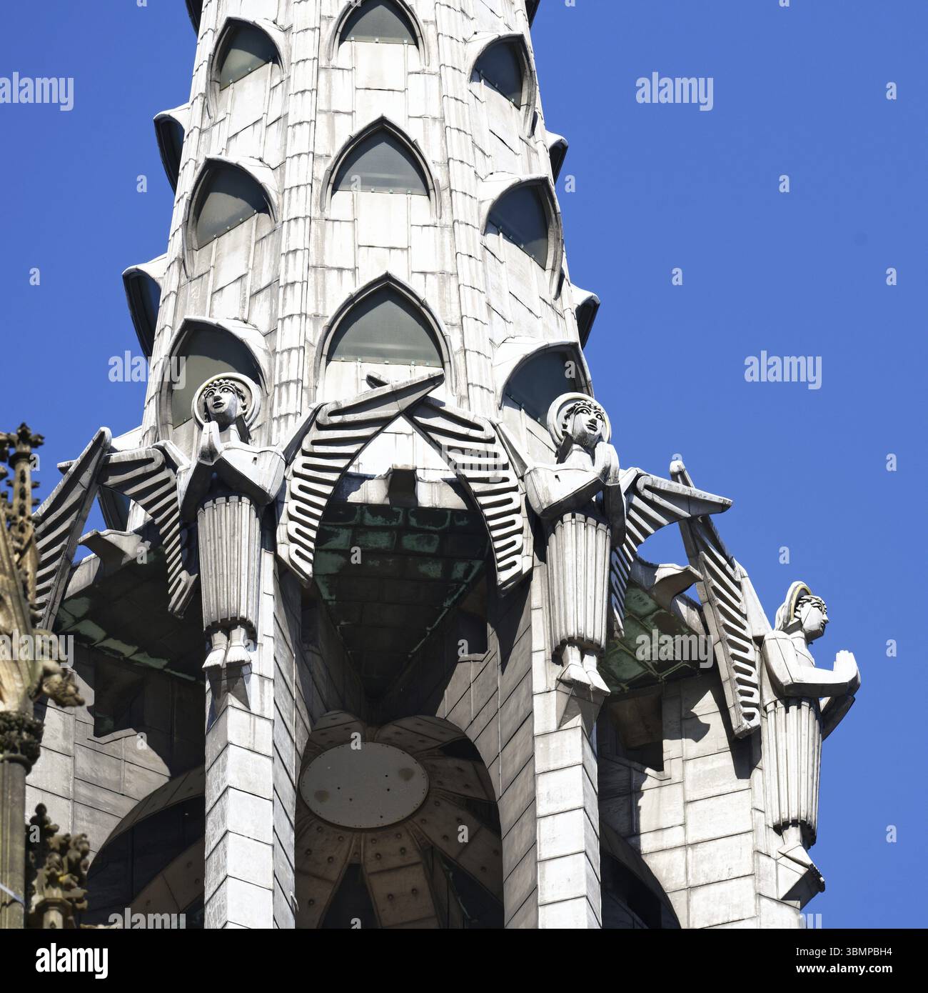 Several angels with elements of art deco on the crossing tower of the ...