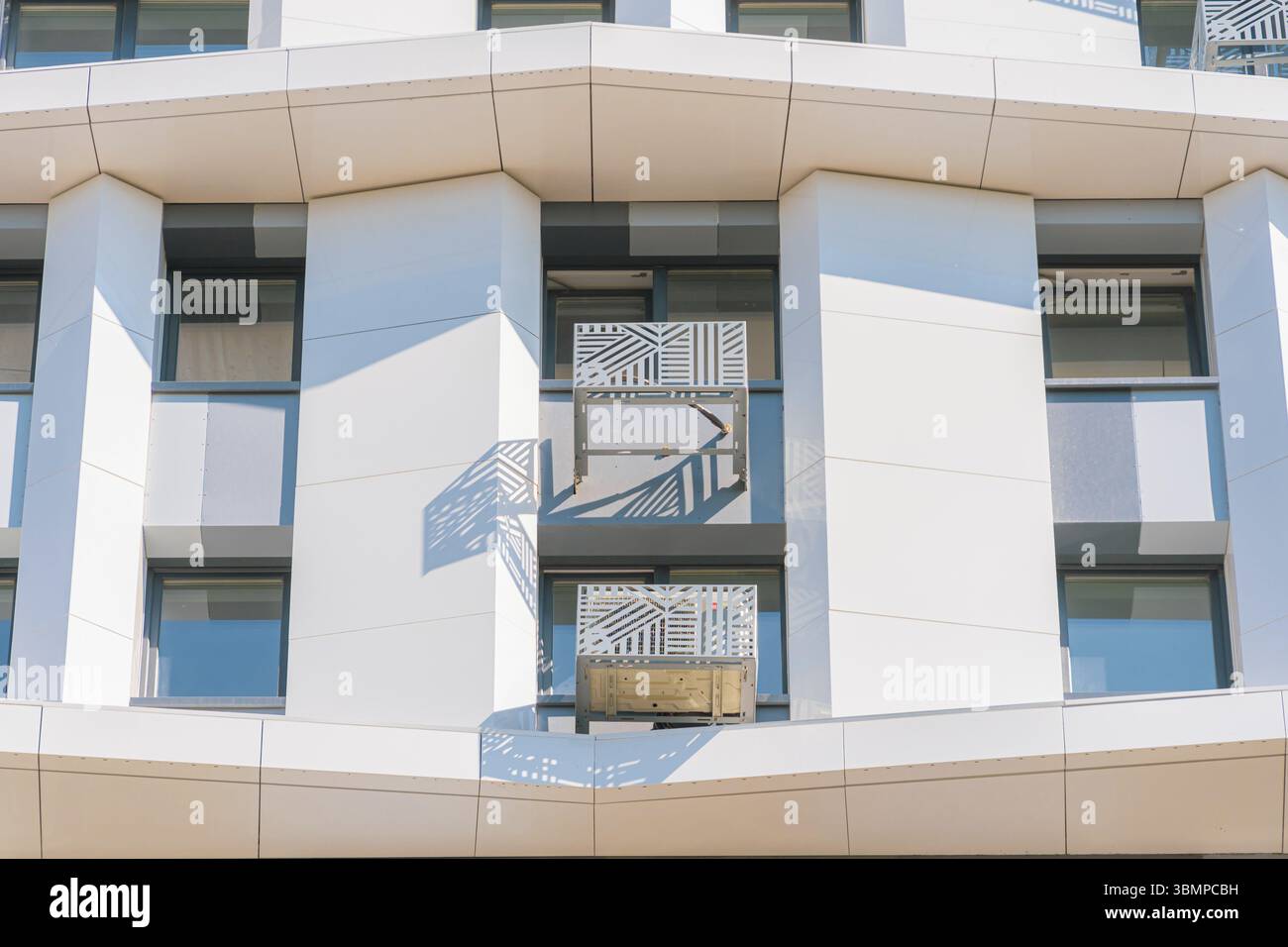 New building facade in housing complex. Modern style in architecture ...