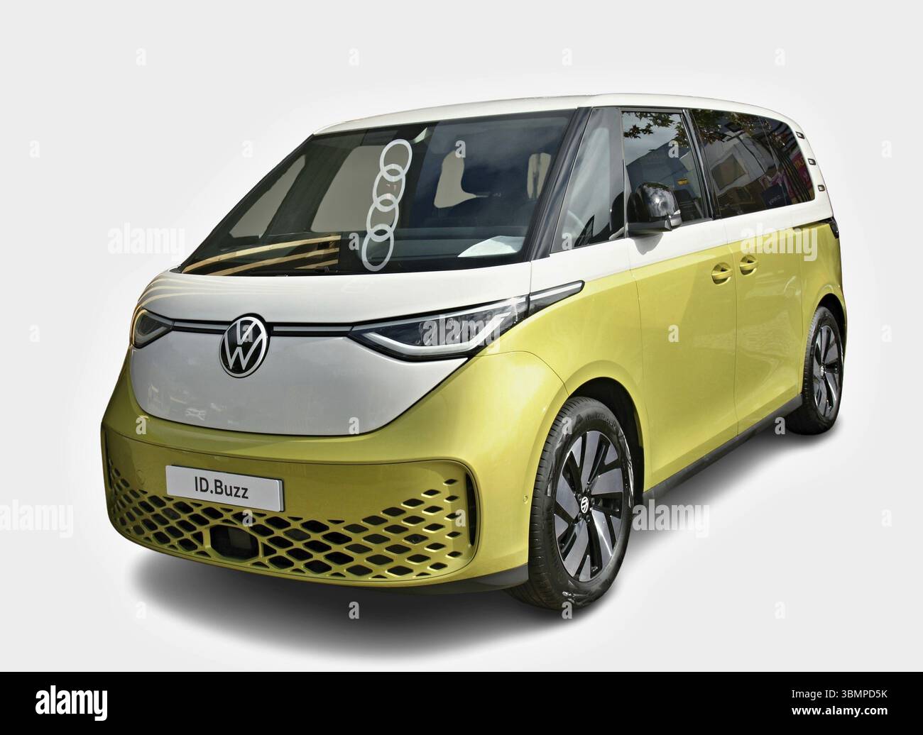 Modern electric Volkswagen ID.Buzz minivan posing in a studio setting ...