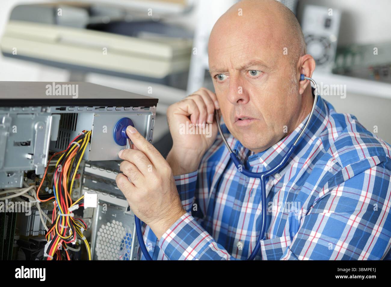 technician repairing inside of hard disk drive Stock Photo - Alamy