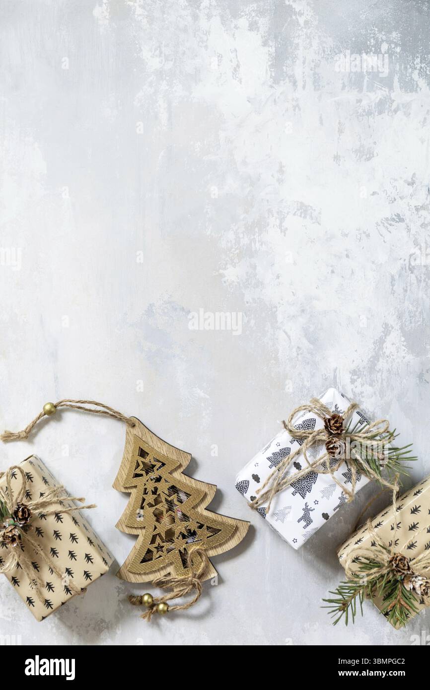 Christmas flat lay with Christmas decorations and presents on a grey ...