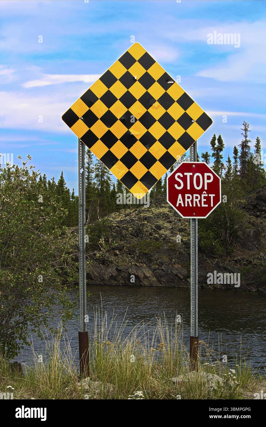 A checkered no entry and stop sign in both english and french Stock ...