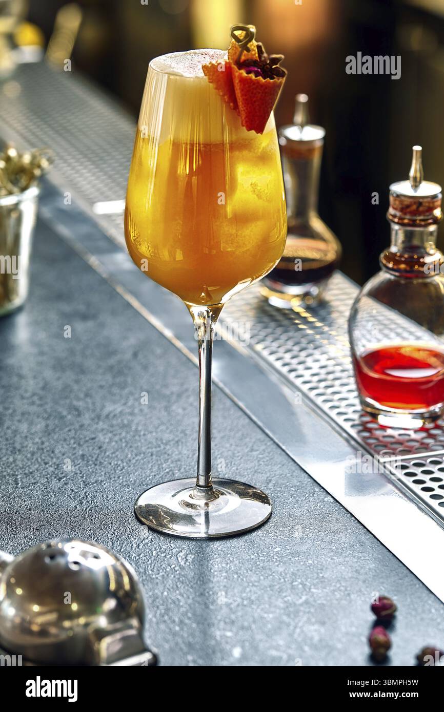 Rosemary cocktail - golden rum, rosemary, fruits juice and syrup on a ...