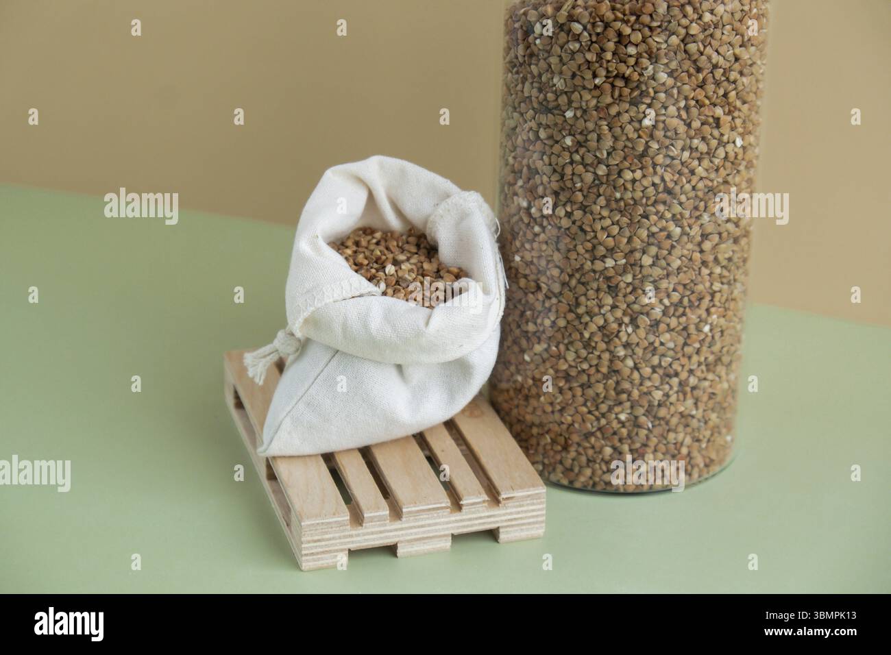Raw buckwheat porridge in sustainable natural packaging. Refillable ...