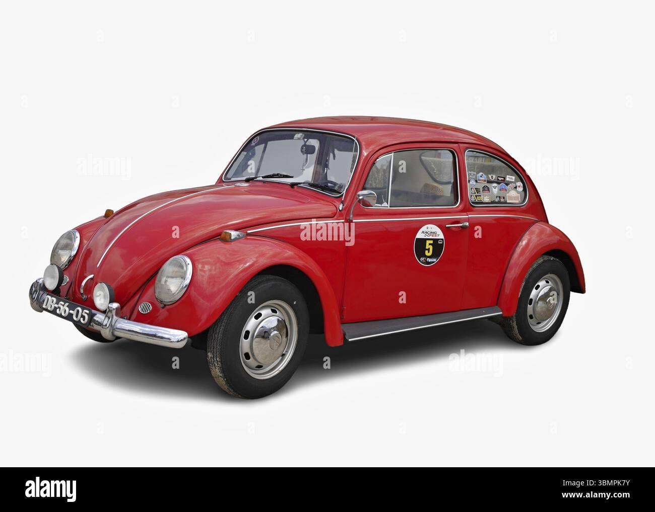 Classic red Volkswagen Beetle car isolated on a white background in a ...