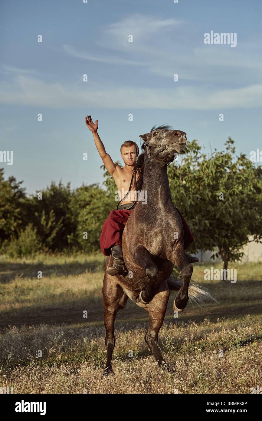 Wide shot cowboy riding on hi-res stock photography and images - Alamy
