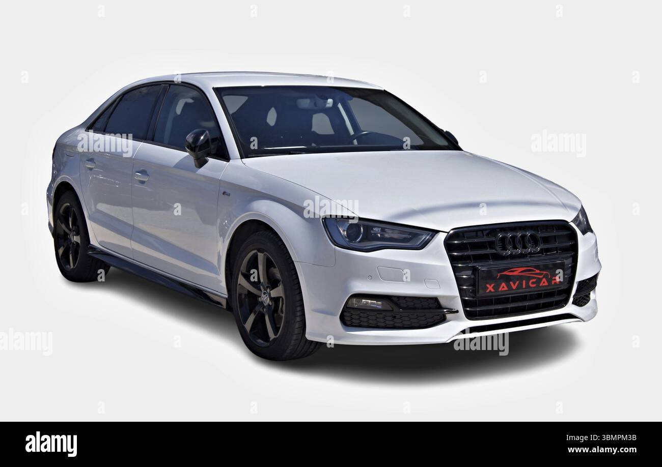 Modern white Audi A3 sedan showcasing its sleek design and black alloy ...