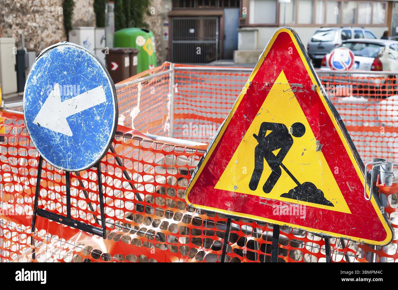 Work in progress on a road sign roadwork Stock Photo - Alamy