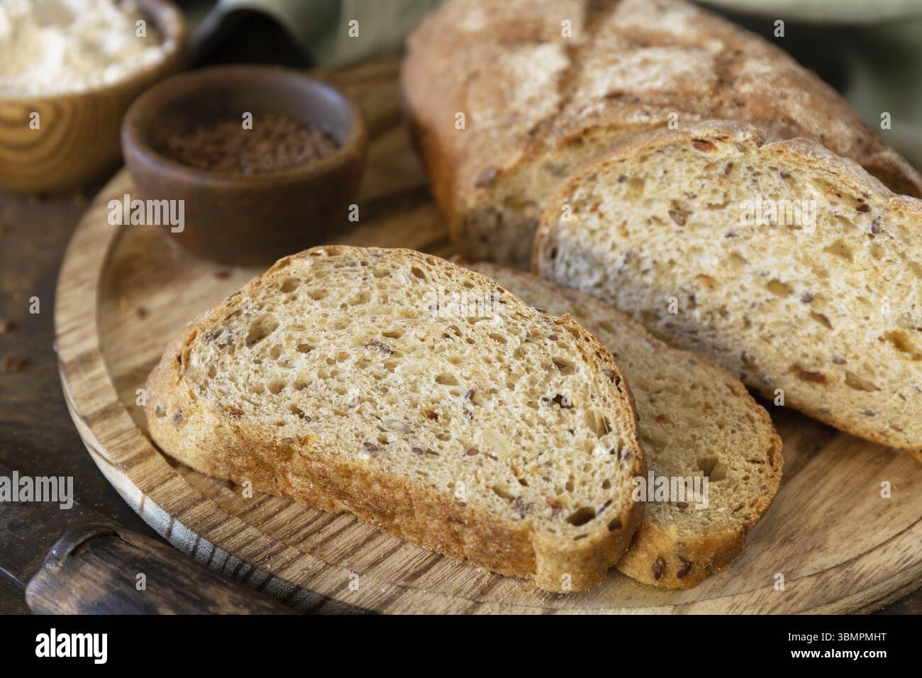 Bread from whole wheat grains, wheat bran, seeds, bio-ingredients over ...