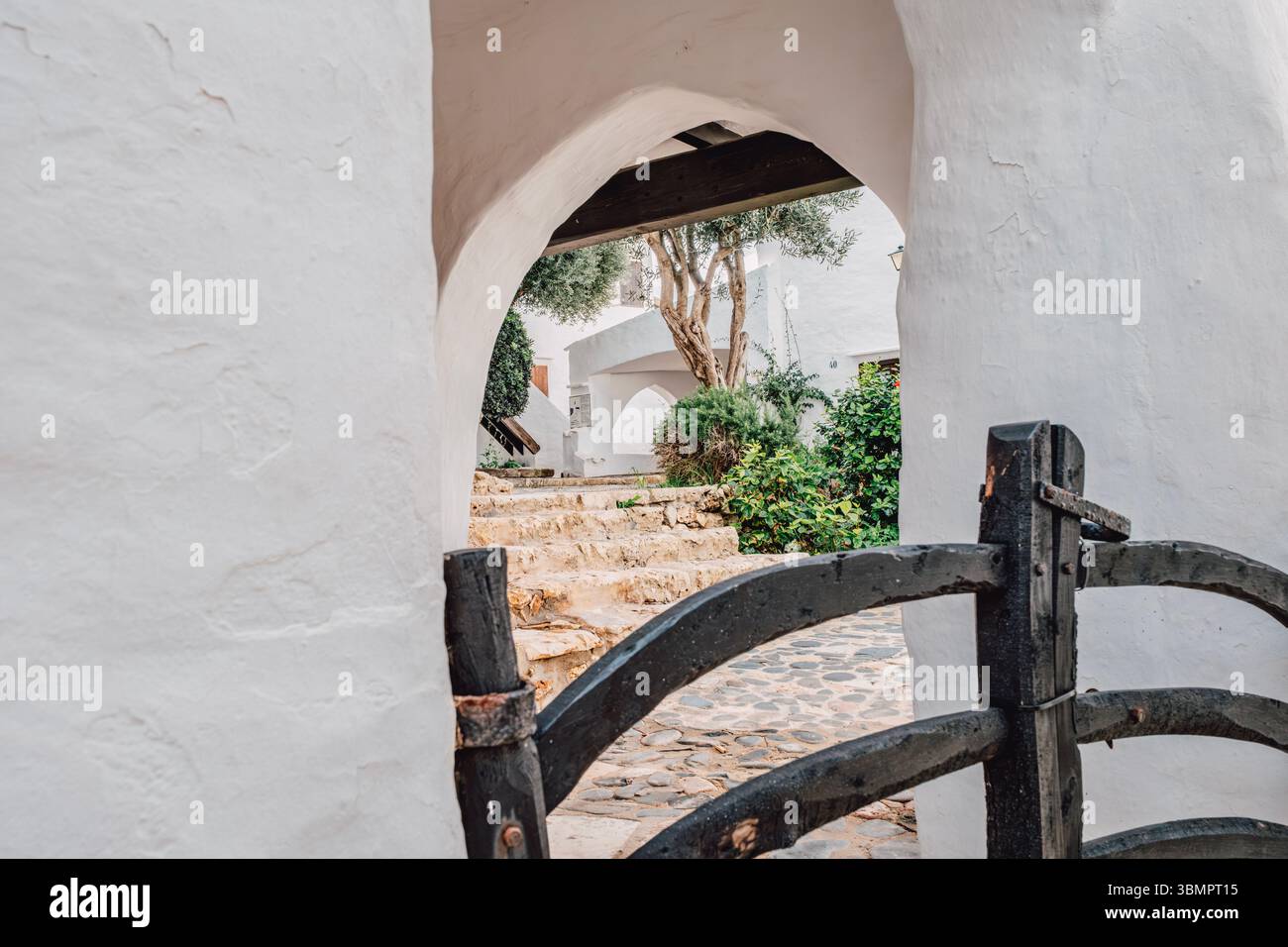 Whitewashed Mediterranean Archway Framing A Traditional Village ...