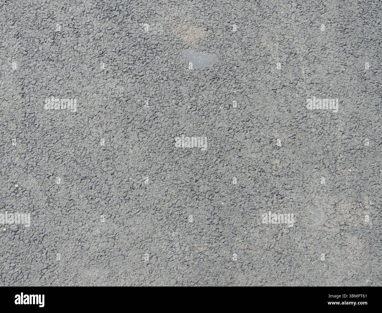 gray asphalt background full frame with ribbed dotted surface in rough ...