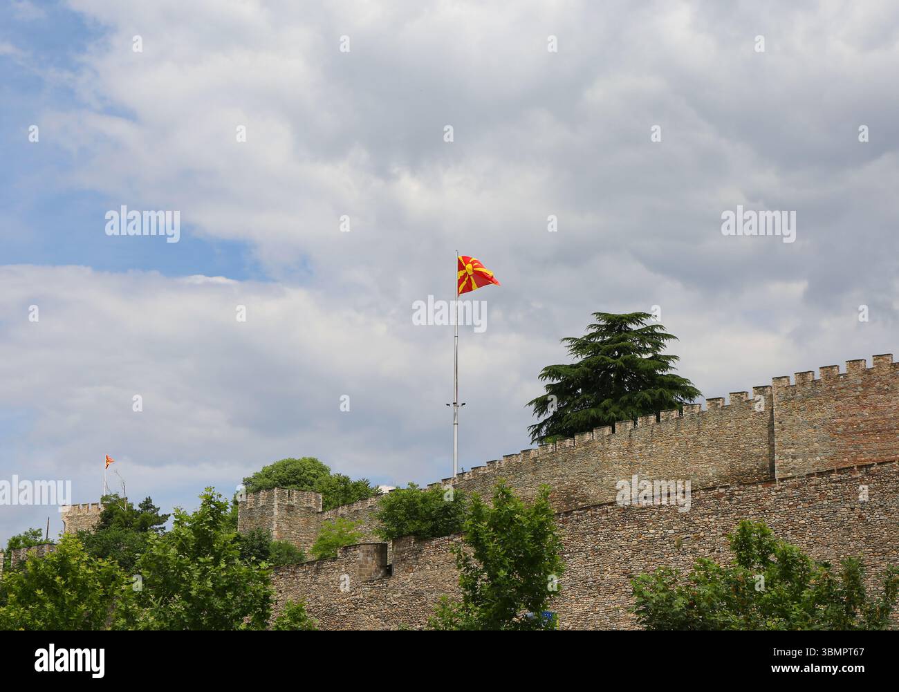 Old Walls of Skopje Castle with North Macedonian flags and Beautiful ...