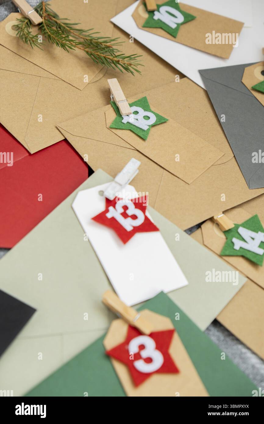 Number on craft envelopes notes with tasks before Christmas holidays ...