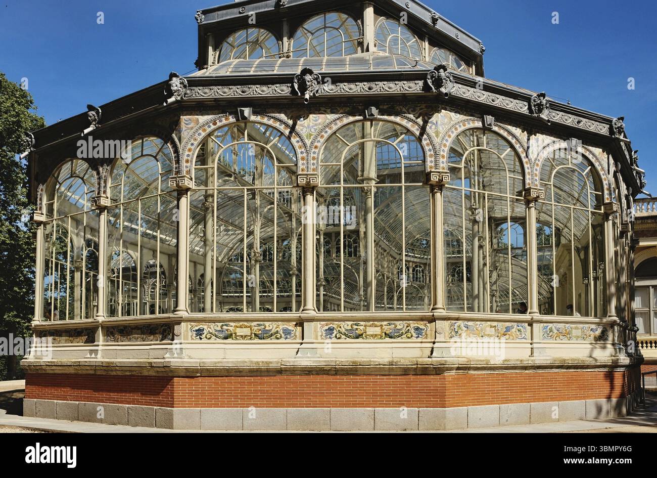 Glass and metal structure of the Crystal Palace reflecting sunlight in ...