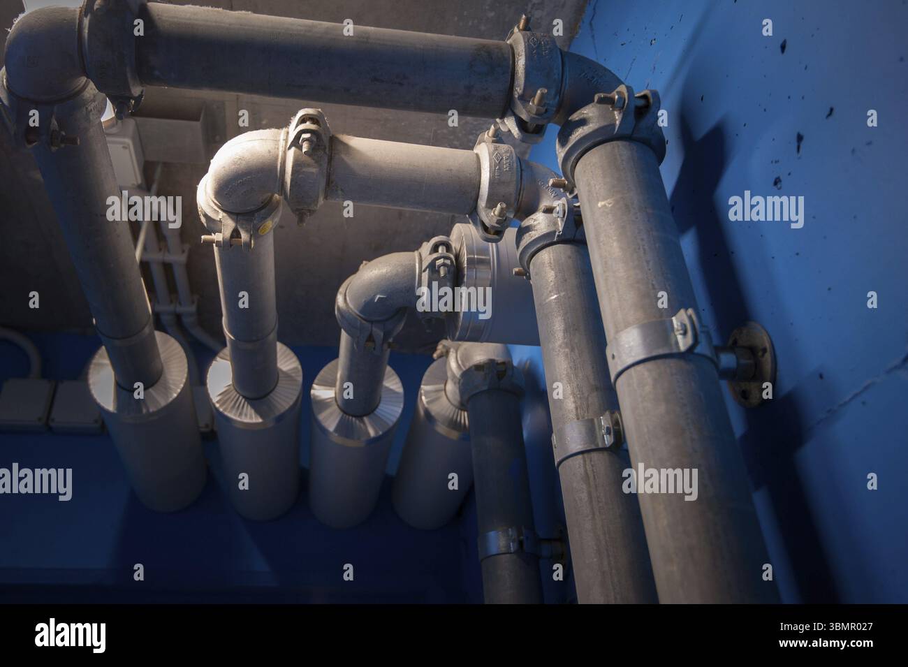 Construction work. Water pipe system. System of water sanitary pipes in ...