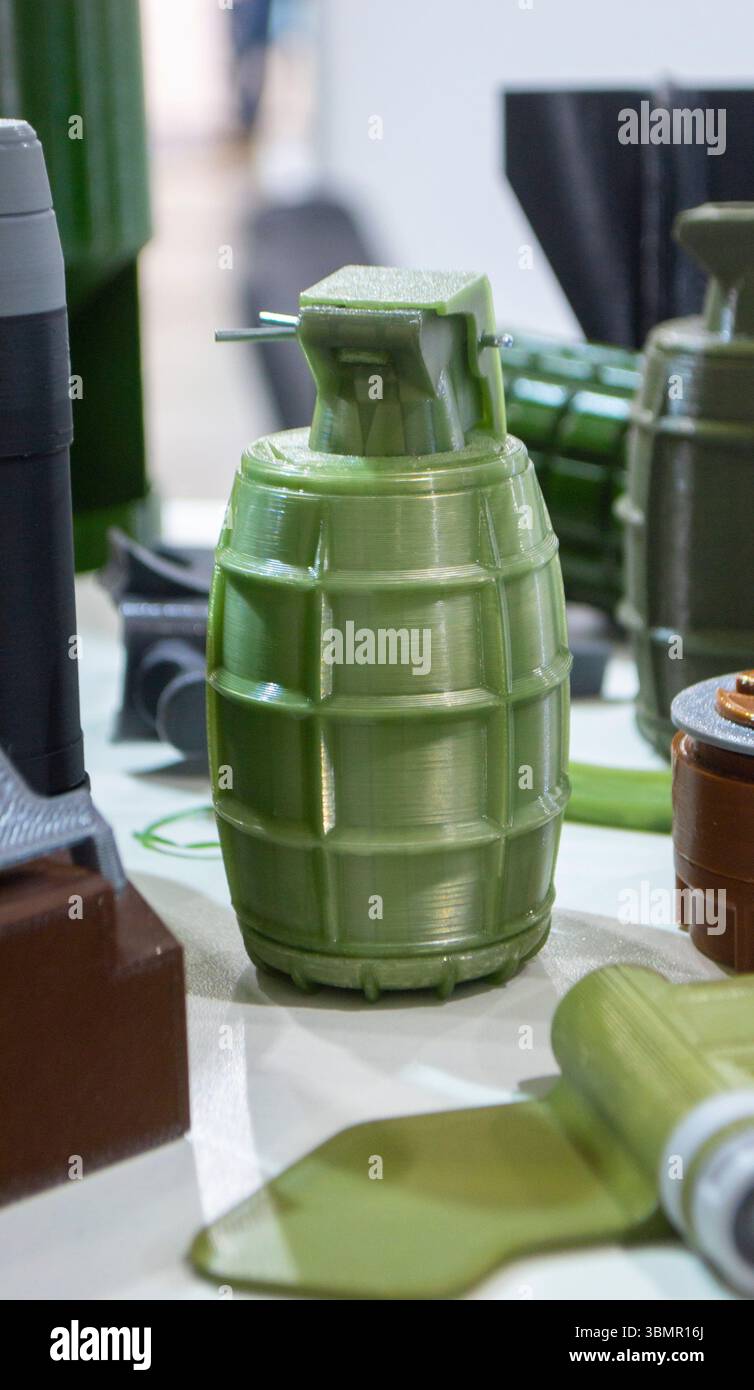 Grenade body printed on 3D printer from melted plastic. Plastic grenade created on 3D printer ...