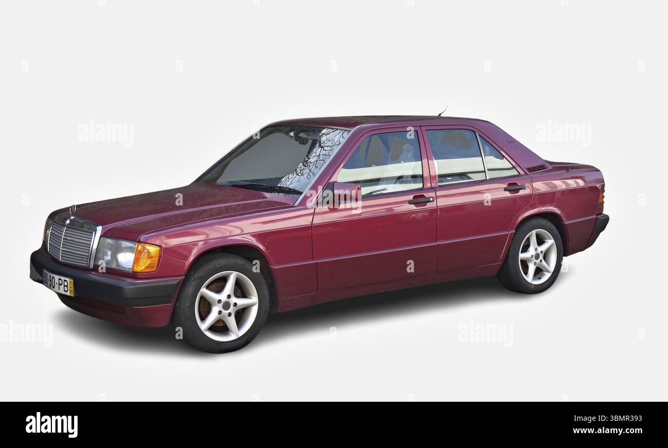 Classic Mercedes-Benz 190E sedan posing in a studio setting with a ...
