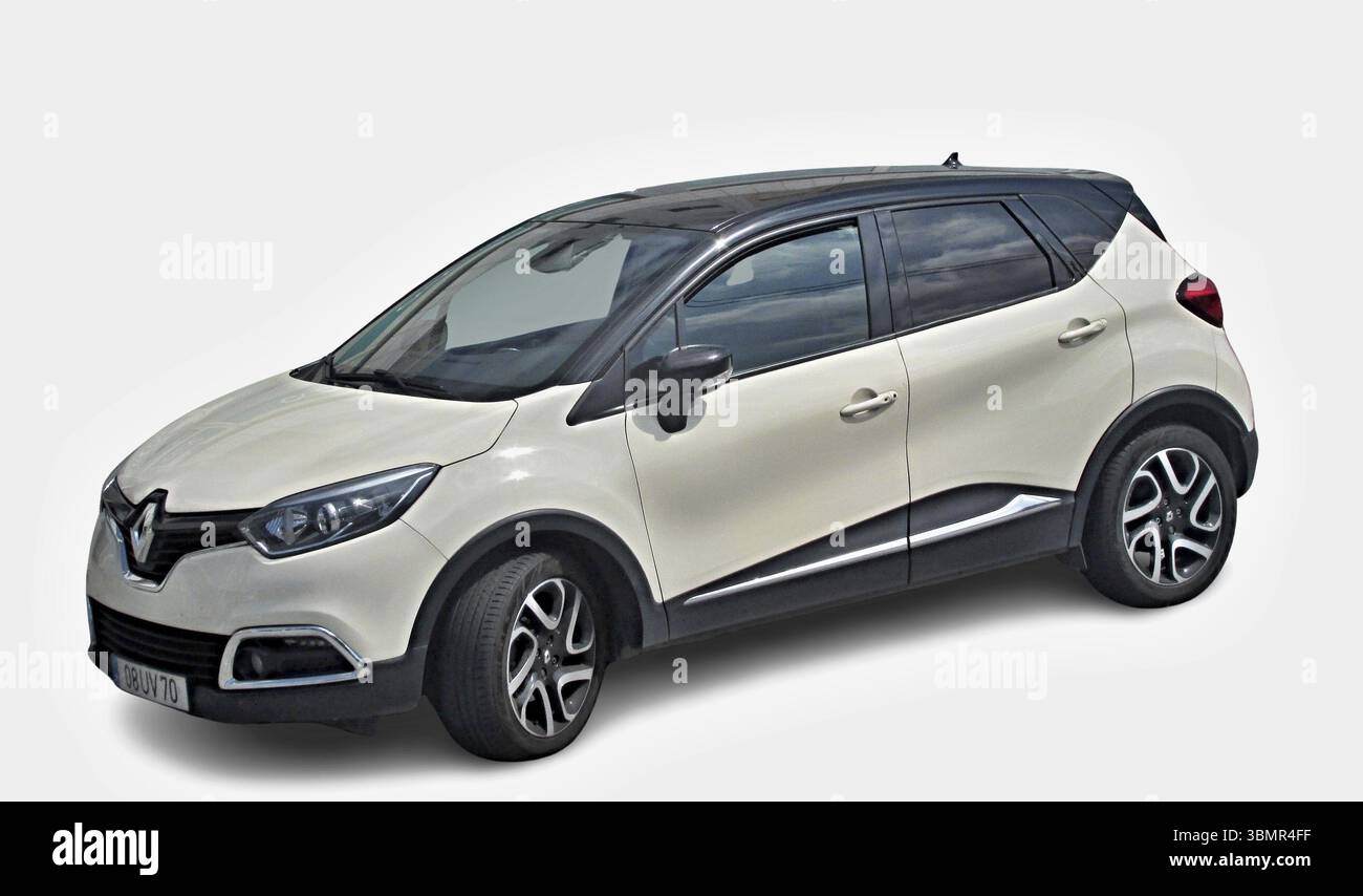 Modern white Renault Captur crossover posing in studio, showing its ...