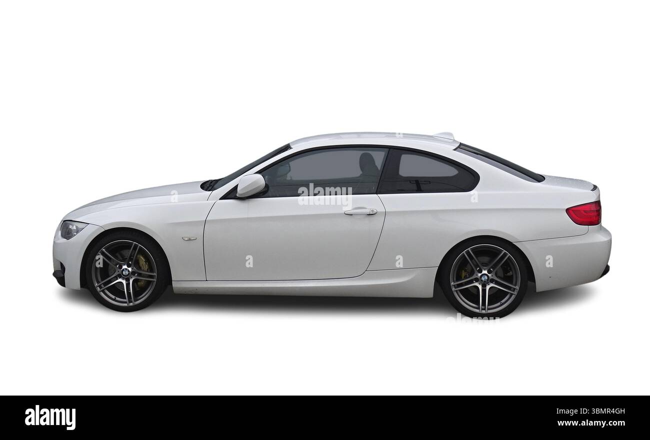 Stylish white BMW 3 series coupe posing on an isolated white background ...