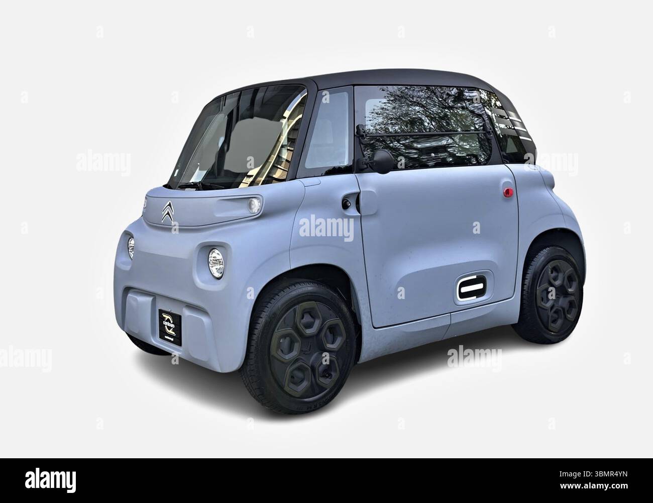 Light blue Citroen Ami, small electric car posing on white background ...