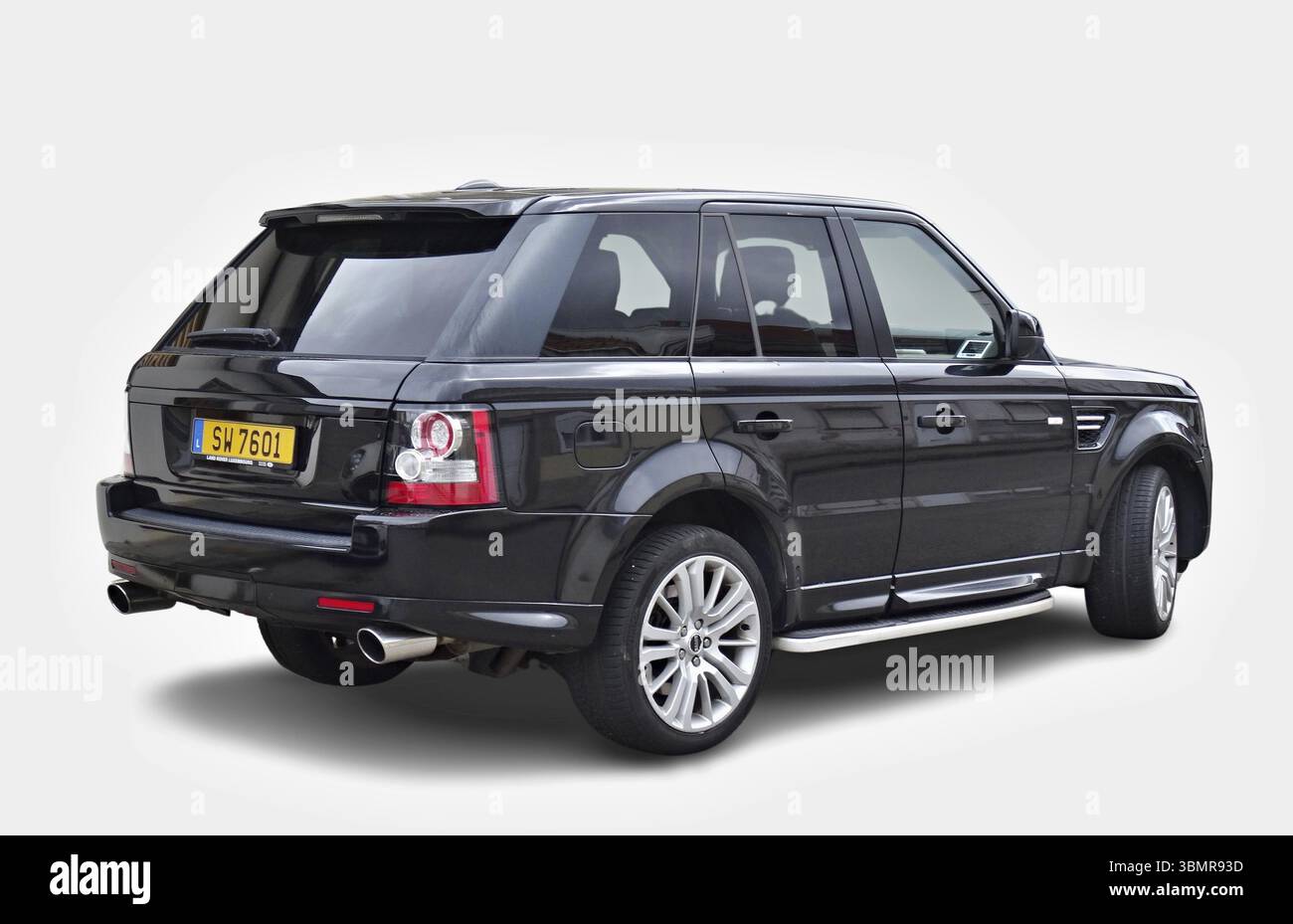 Powerful black Range Rover Sport showing its rear on a white background ...