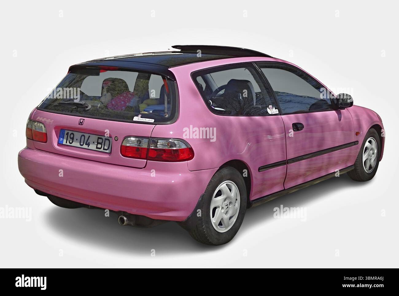 Customized pink Honda Civic with sunroof parked, ready for tuning ...