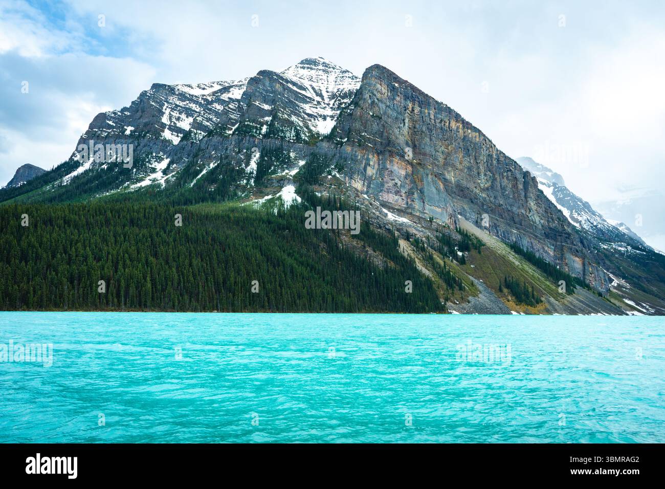 Explore rocky cliff towering over hi-res stock photography and images ...