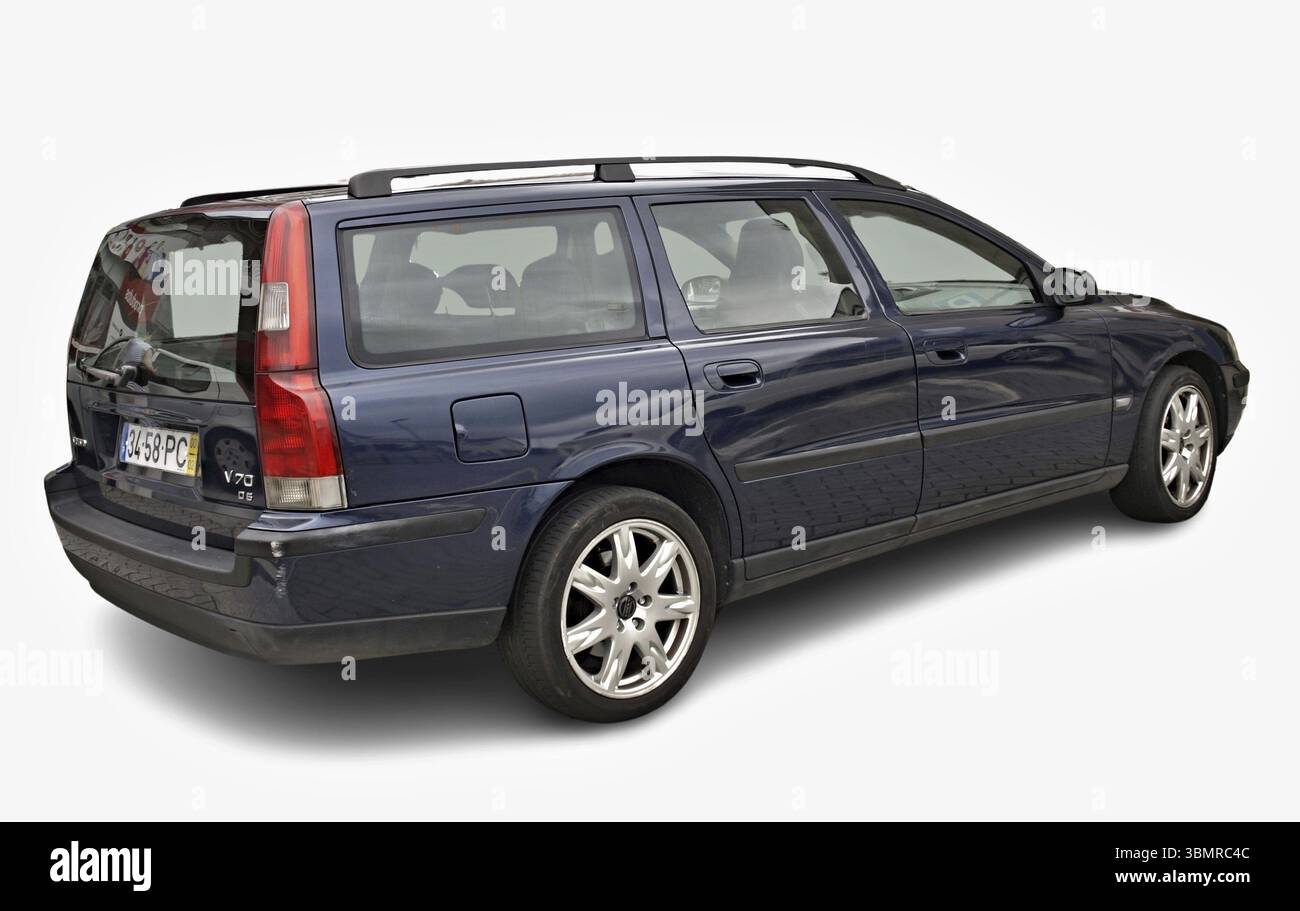 Dark blue Volvo V70 station wagon isolated on white background ...