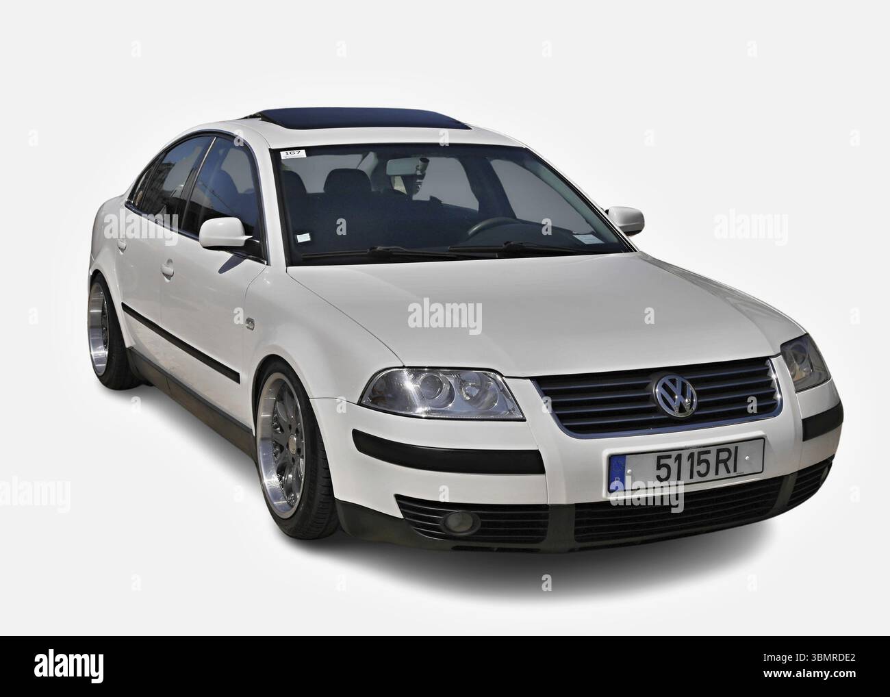 Tuned white Volkswagen Passat B5.5 sedan standing still on white ...