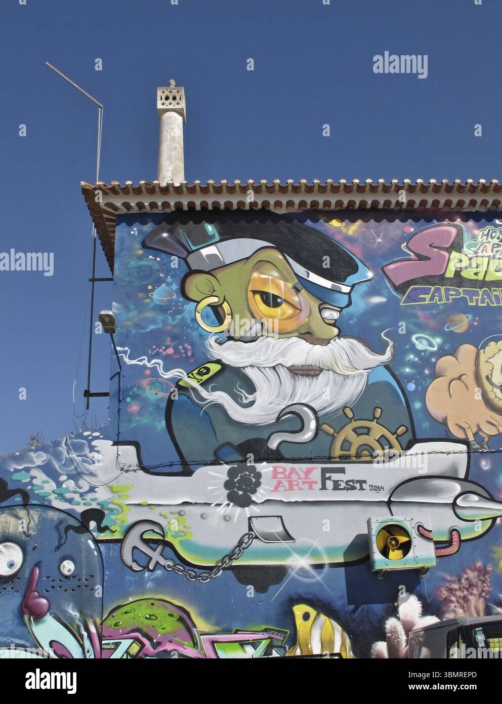 Large colorful graffiti art of a space captain piloting a spaceship on ...