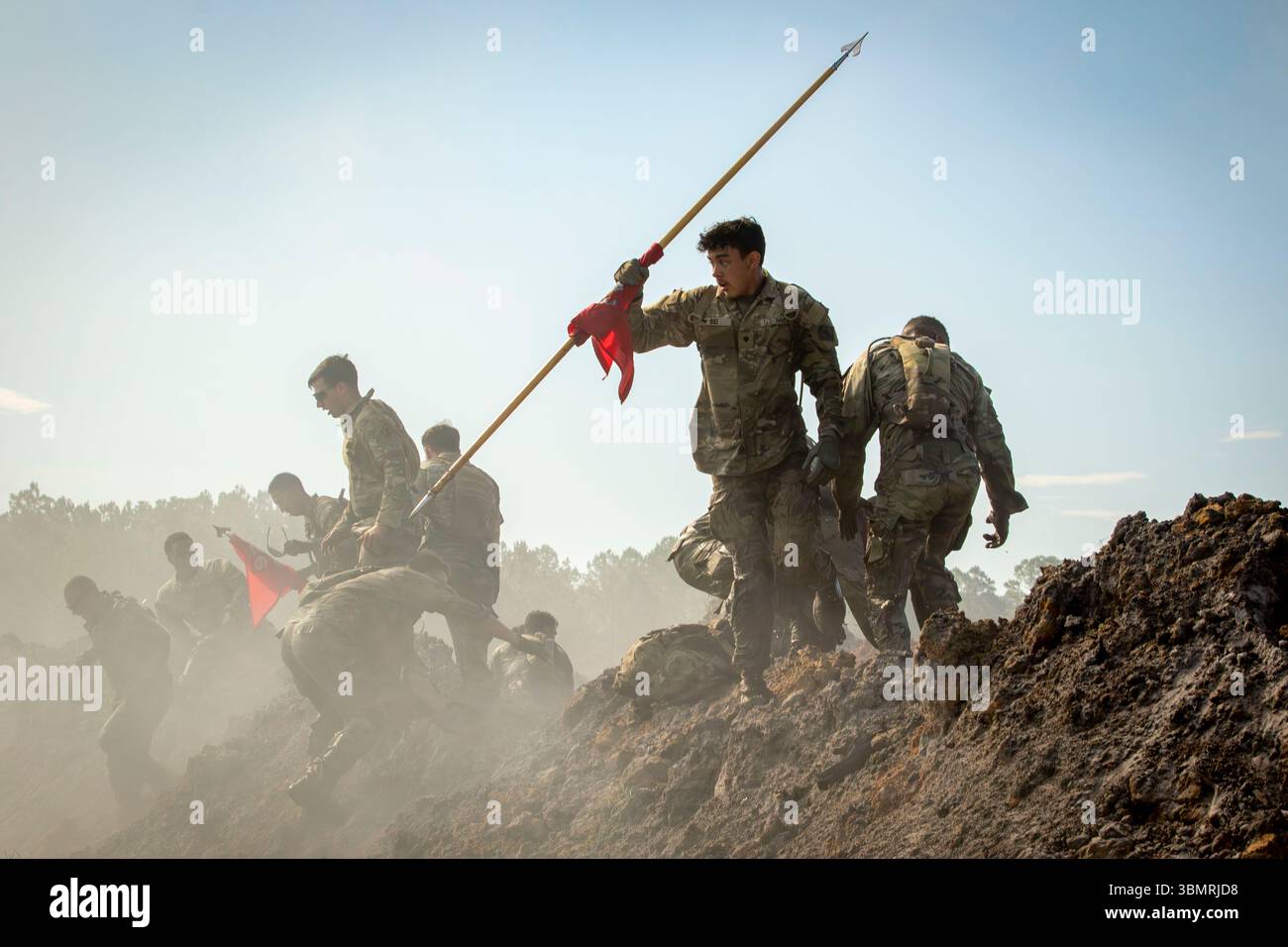 U.S. Soldier assigned to the 3rd Infantry Division carries a company ...