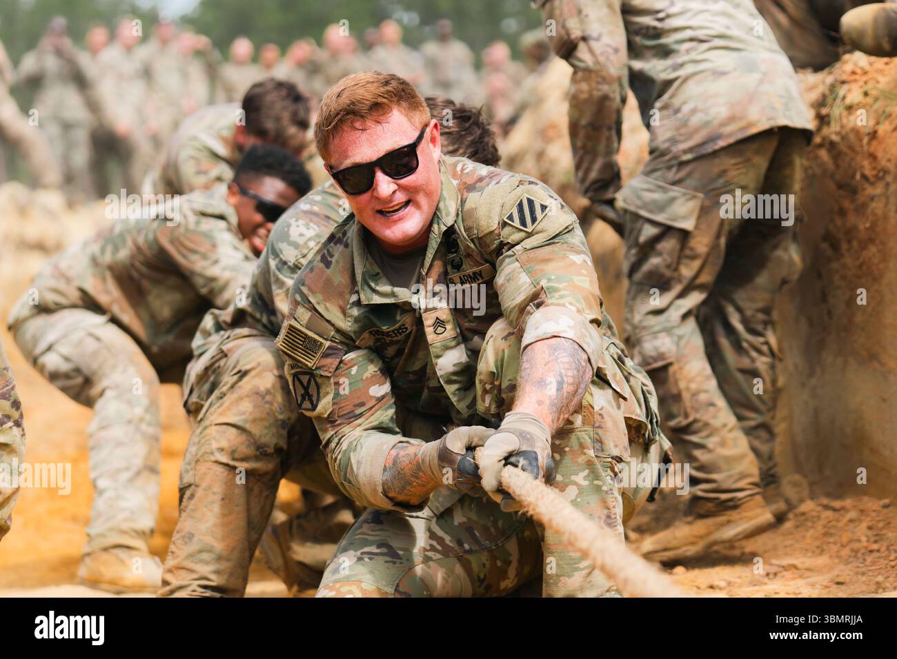 U.S. Soldiers assigned to 3rd Infantry Division, compete in tug of war ...