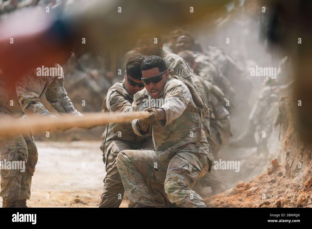 U.S. Soldiers assigned to 3rd Infantry Division, compete in tug of war ...