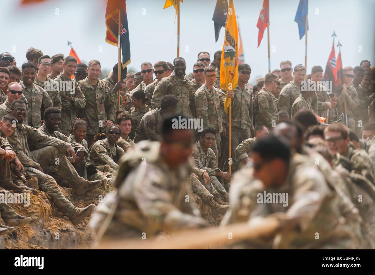 U.S. Soldiers assigned to 3rd Infantry Division, cheer on Soldiers ...