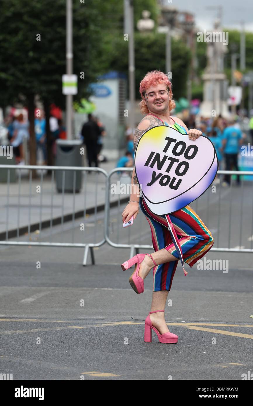 Jack Swift is seen holding a sign ahead of the Dublin Pride parade ...