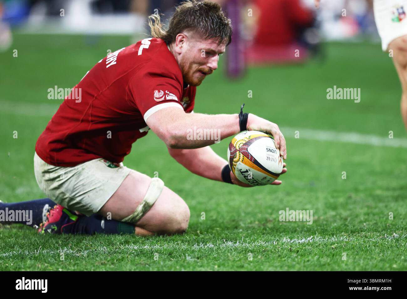 Joe McCarthy of the British & Irish Lions scores a try during their rugby match against the ...