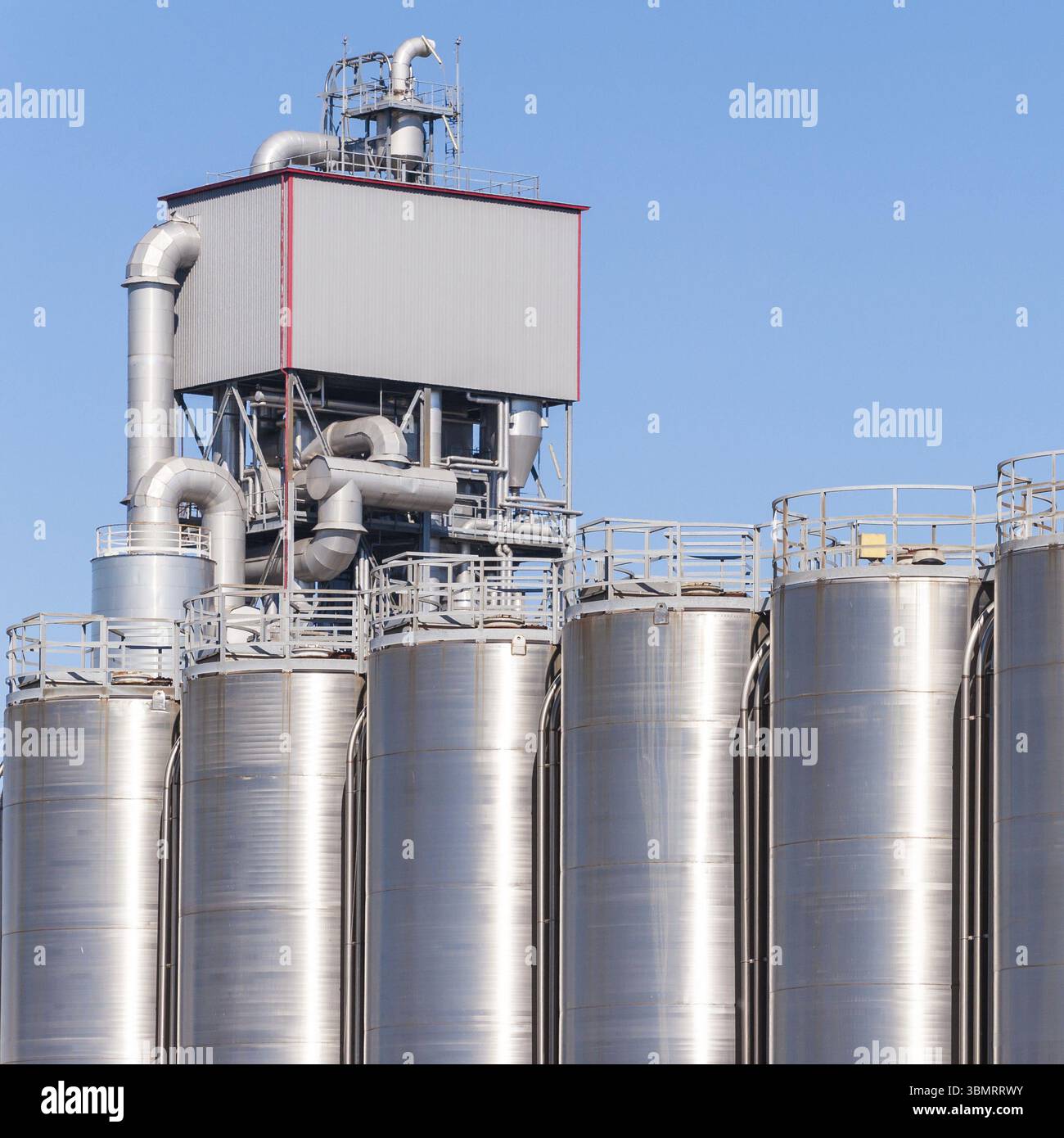 Detail of chemical plant, silos and pipes Stock Photo - Alamy