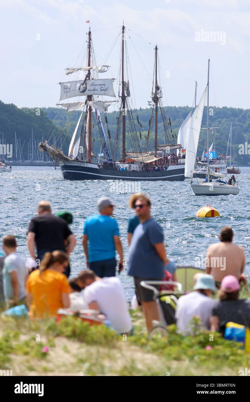 Kiel, Germany. 28th June, 2025. Large and small sailing ships sail on the Kiel Fjord during the ...