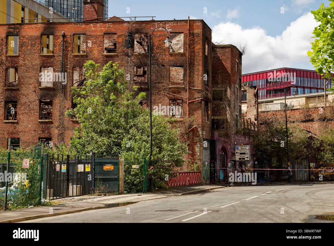 The burnt out ruins of the Hotspur Press building, former Georgian mill ...