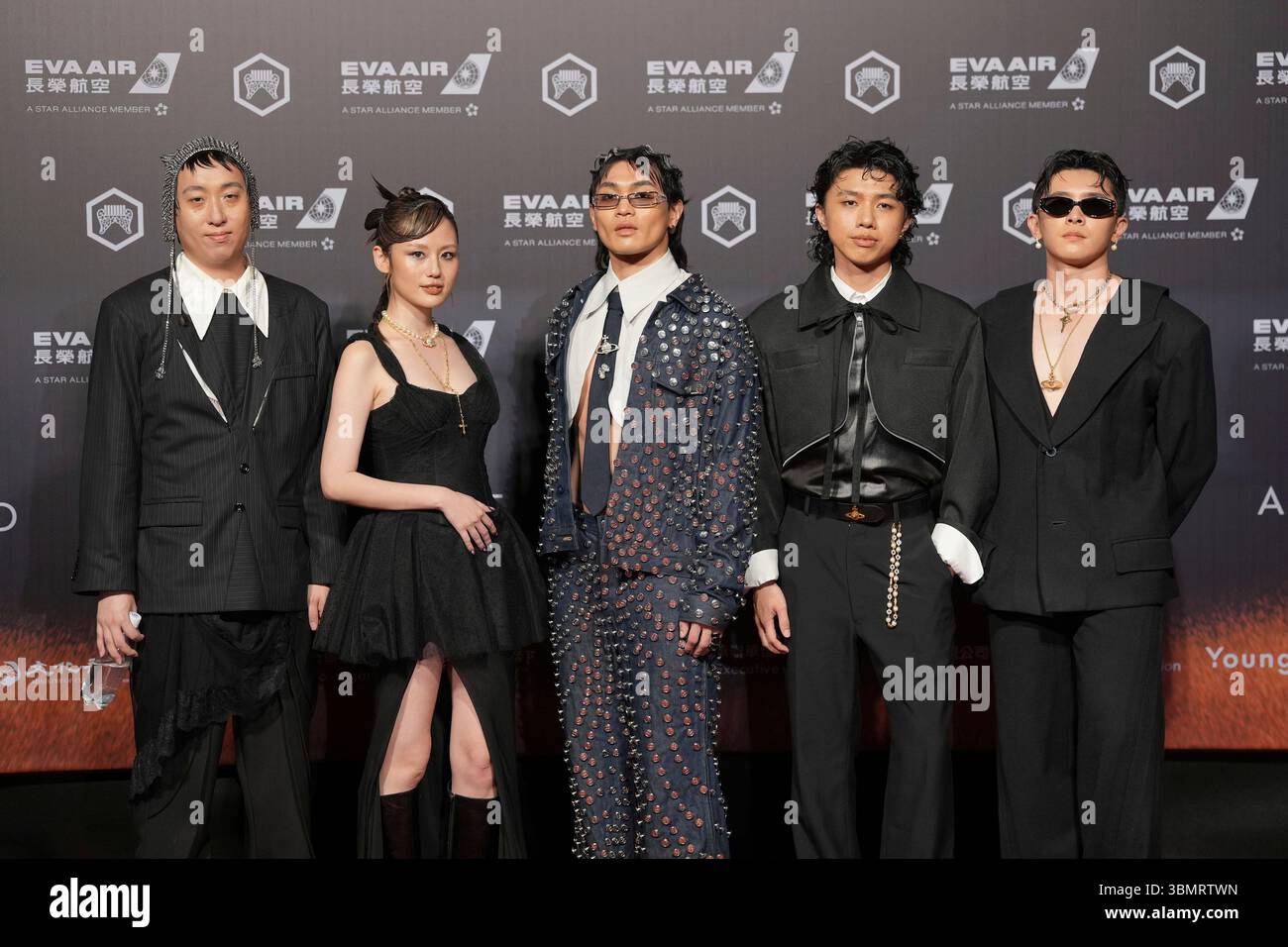 Taiwanese Pop group Amazing Show pose for a photo as they arrive for ...