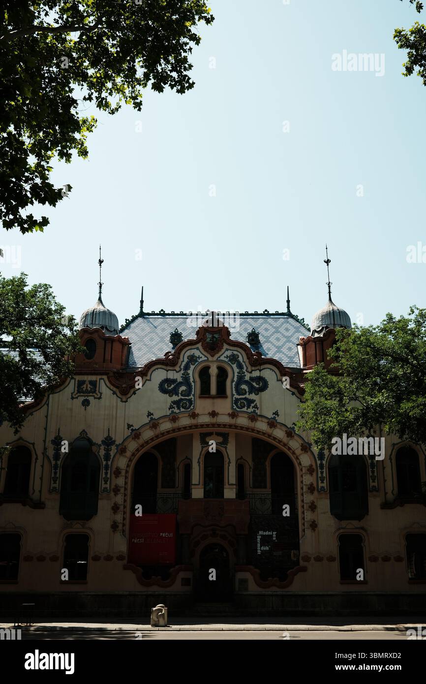 Ornate Art Nouveau building with decorative facade, domes, and floral ...