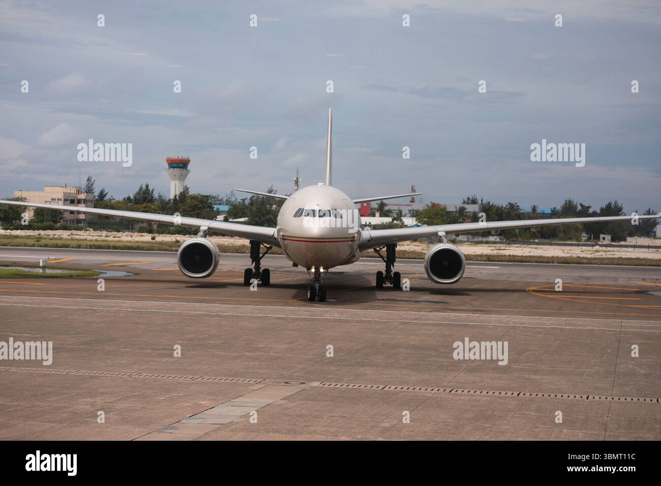 Wide-Body Jet Facing Camera While Taxiing on Airport Runway ...