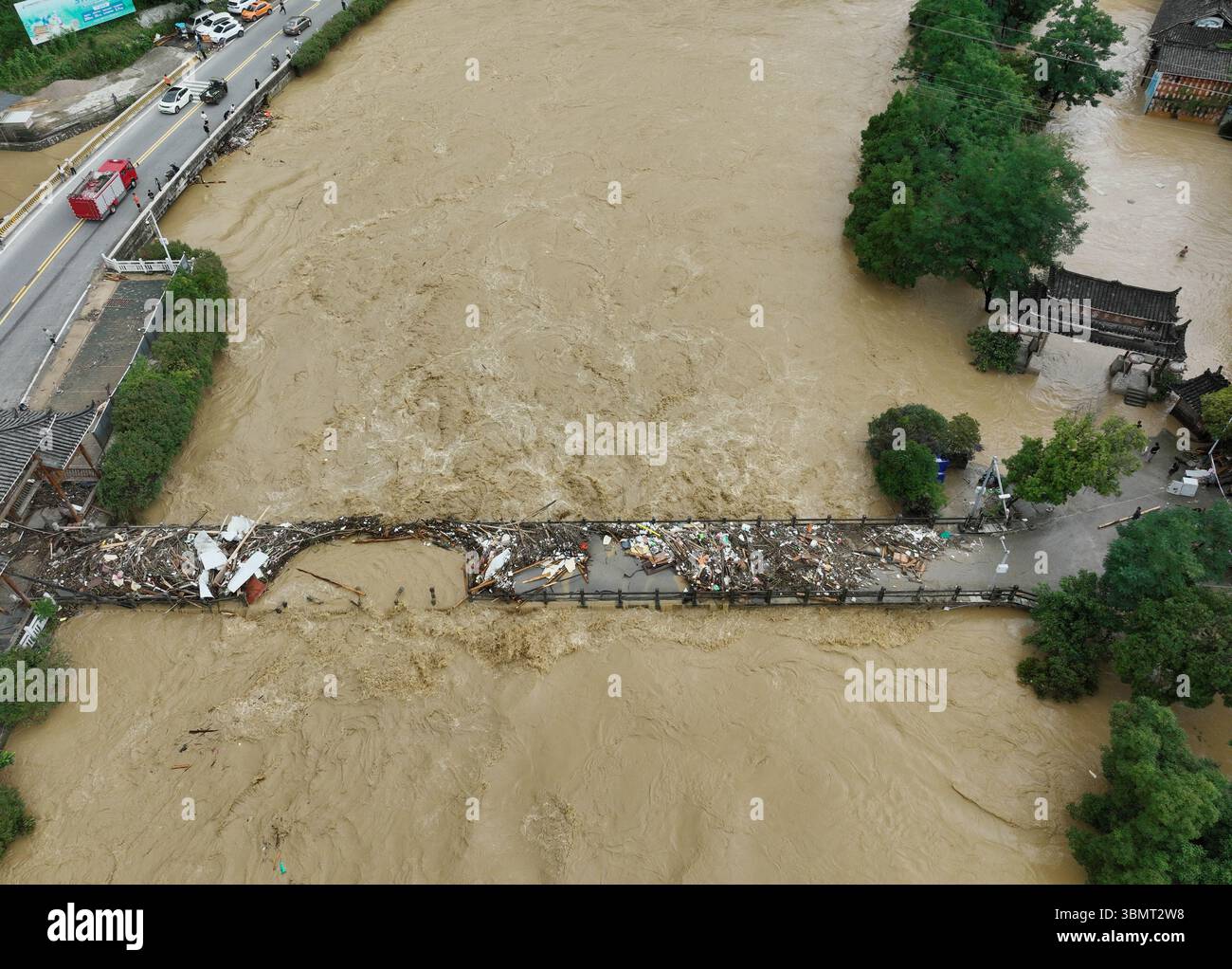 QIANDONGNAN, CHINA - JUNE 28, 2025 - The flood of the Bala River rose ...